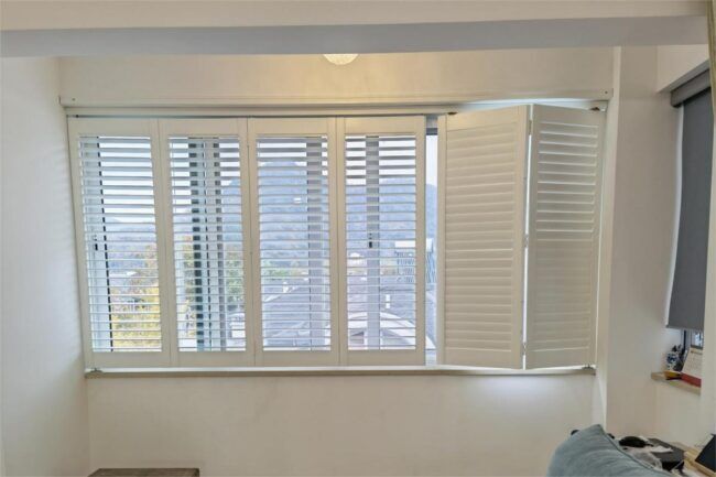 Plantation Shutters Cost: Vinyl vs Faux Wood vs Real Wood